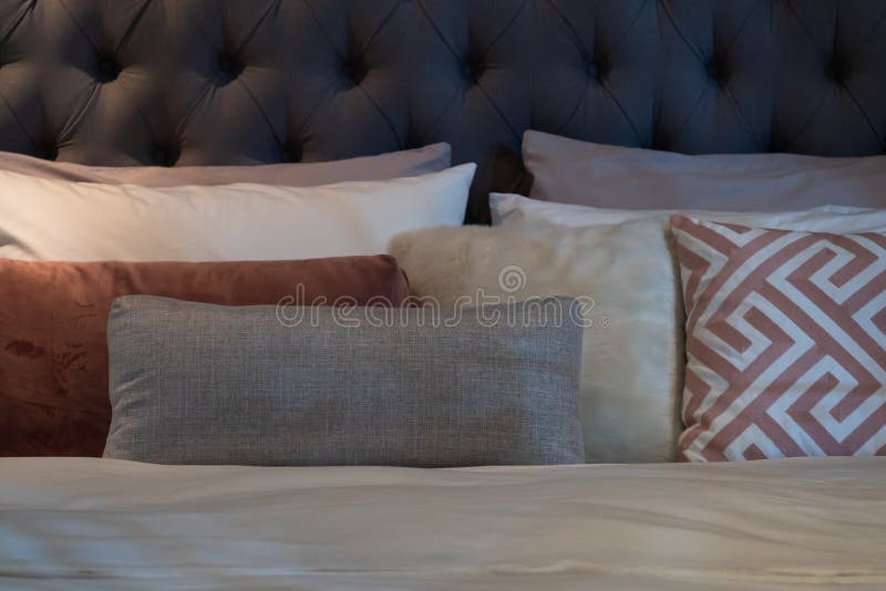 Modern Gray Headboard with Fabric Pillows and Checkered Pattern Stock ...