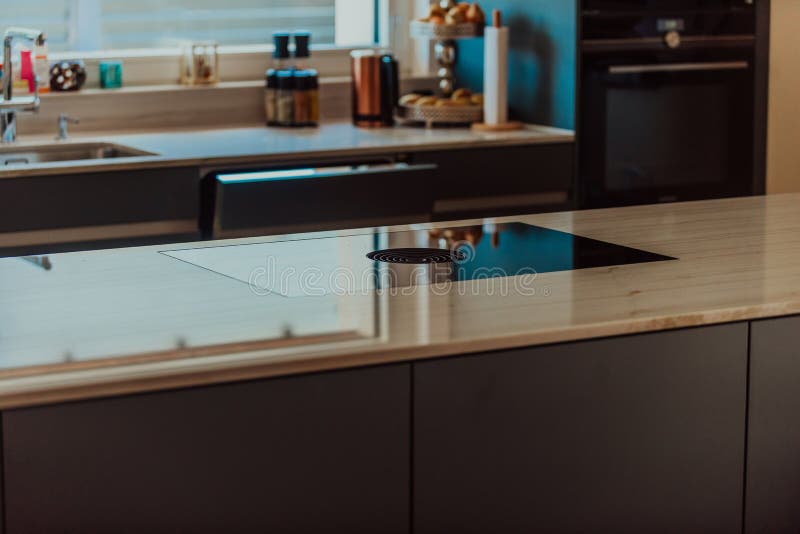 Modern Gray Kitchen with Electronic Devices and Decorative Items Stock ...