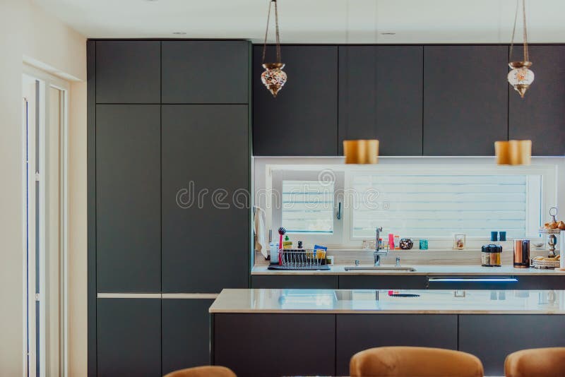 Modern Gray Kitchen with Electronic Devices and Decorative Items Stock ...