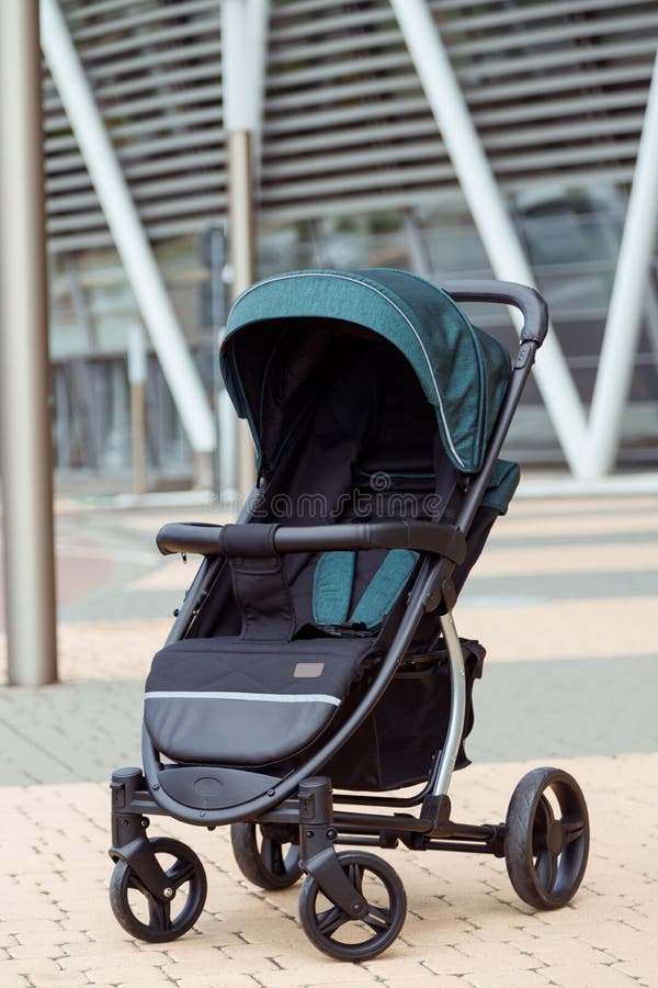 Modern Green Summer Opened Baby Stroller with Hood Outdoors Stock Image ...