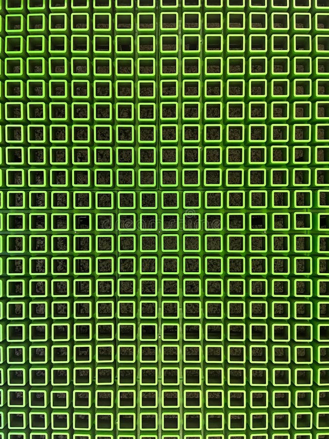Modern Green Wallpaper Featuring an Intricate Grid Pattern Stock ...