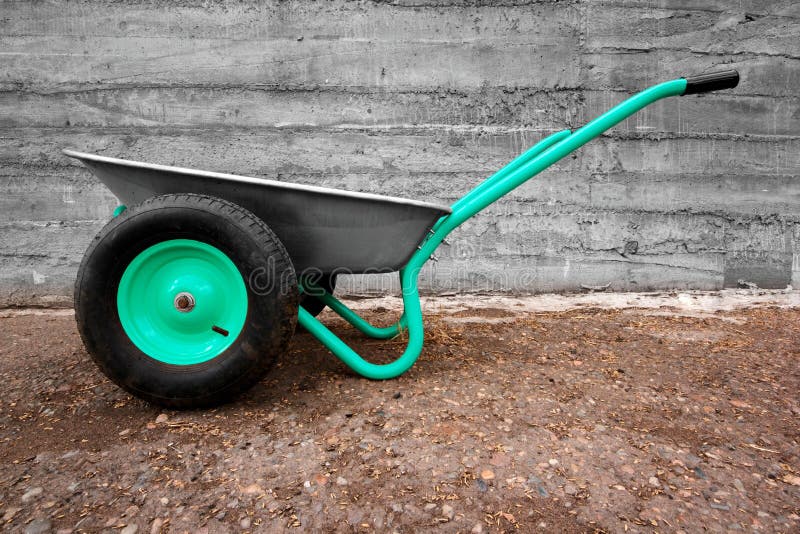 Modern green wheelbarrow stock image. Image of modern - 95731975