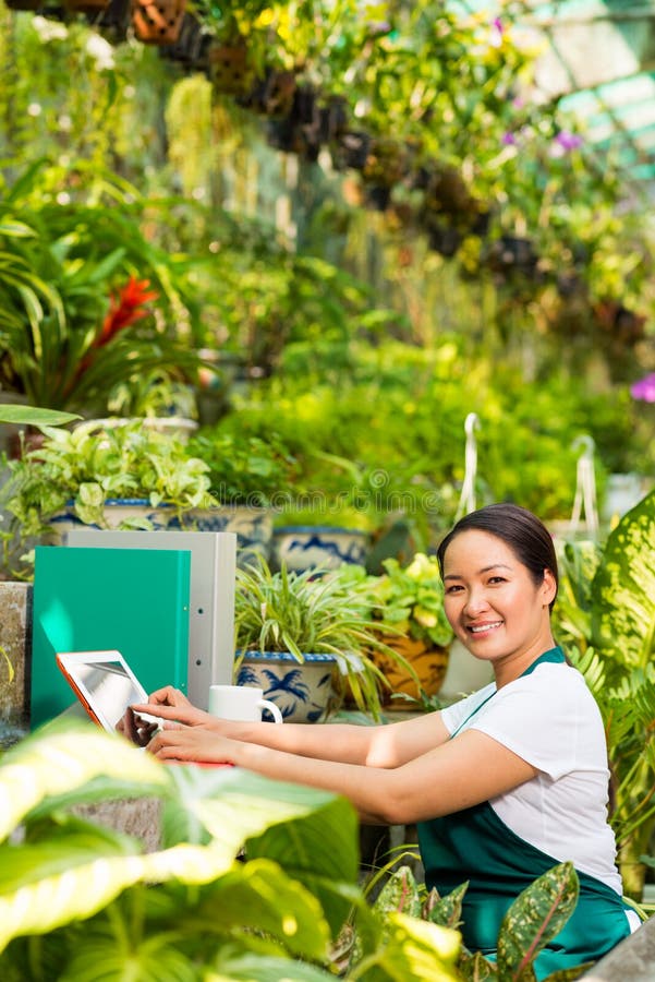 Modern greenhouse worker stock photo. Image of botanical - 54536050