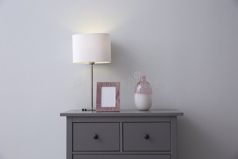 Modern Grey Chest of Drawers Near Wall in Room. Interior Design Stock ...