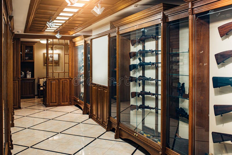 Modern Gun Store Interior with Different Rifles on Showcase Stock Image ...