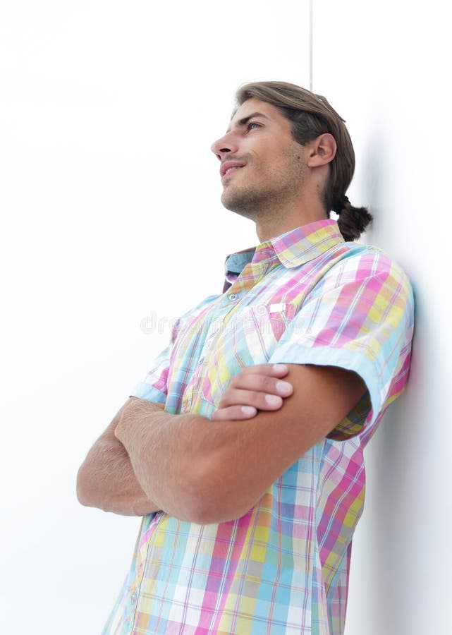 Modern Guy Leaning on Wall and Looking Forward. Stock Photo - Image of ...