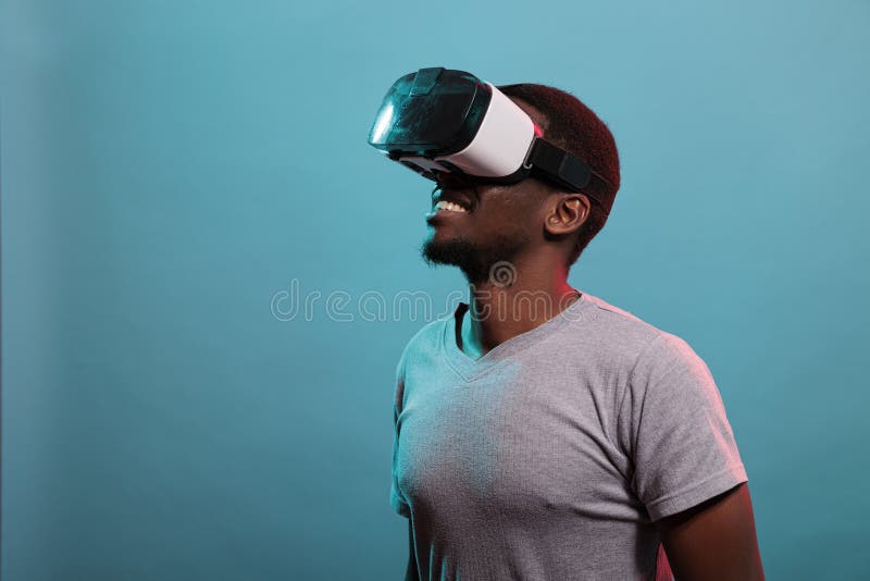 Modern Guy Using Vr Headset To Play with 3d Futuristic Simulation Stock ...