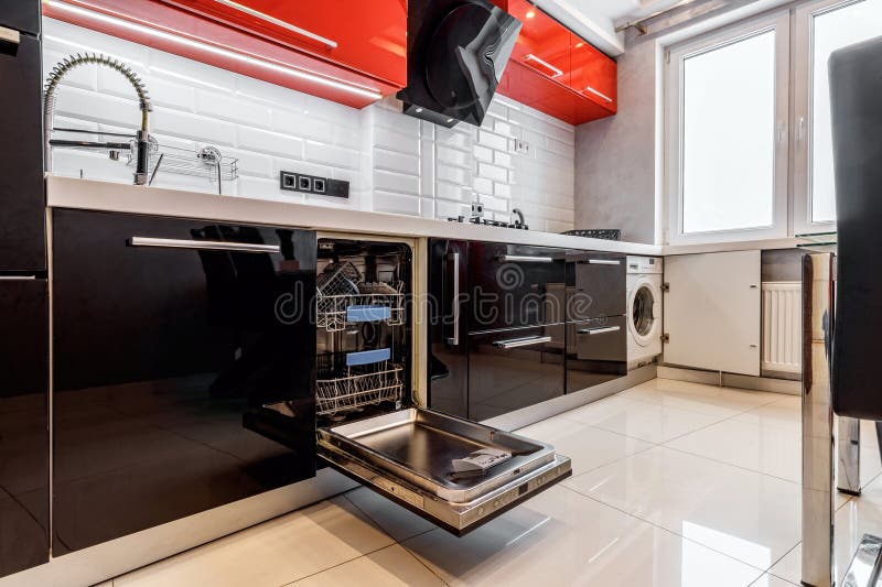 Modern Half Open Empty Dishwasher in a Modern Kitchen Stock Image ...