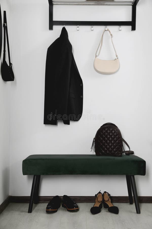 Modern Hallway Interior with Stylish Bench and Clothes Stock Photo ...