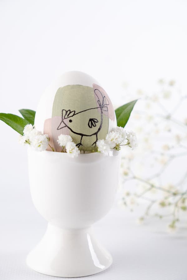 Modern Hand Painted Easter Egg in Egg Stand with Flovers. Minimal ...