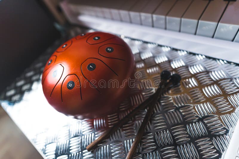Modern Happy Steel Drum with Multi Notes and with Sticks Stock Photo ...