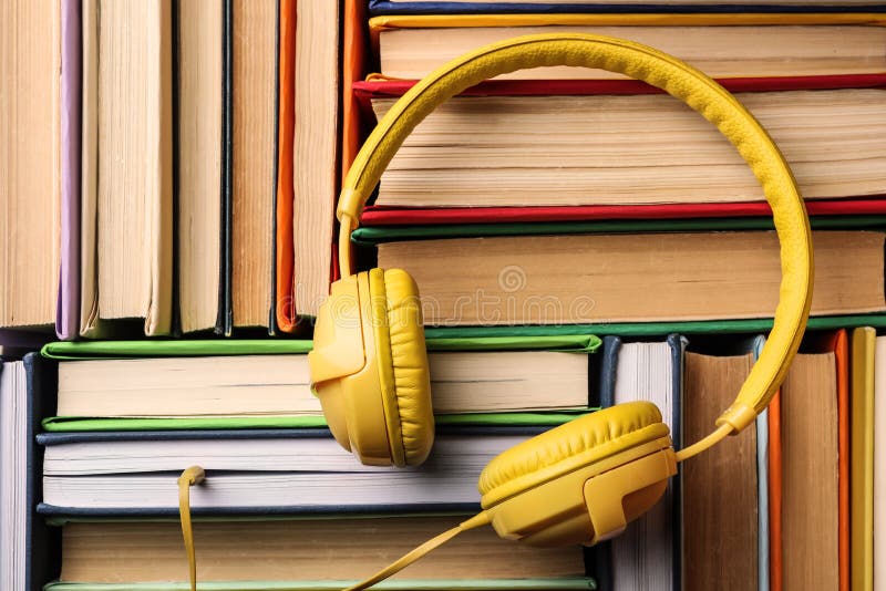 Modern Headphones on Stack of Books Stock Image - Image of read, books ...