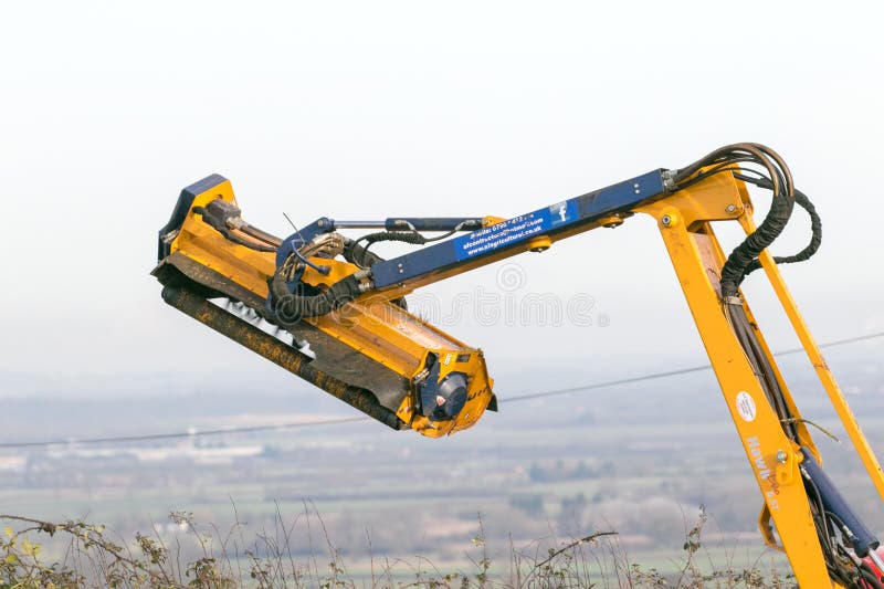 Modern hedge cutter editorial stock photo. Image of machinery - 90381263