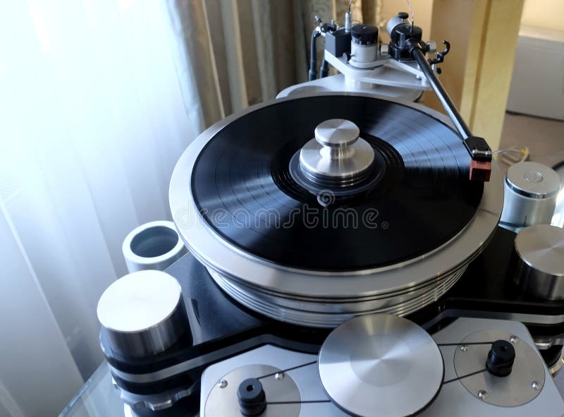Modern High-precision Record Player with a Rotating Disc with an ...