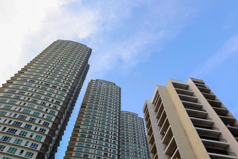 Modern High-rise Apartment Over Blue Sky Background Stock Photo - Image ...