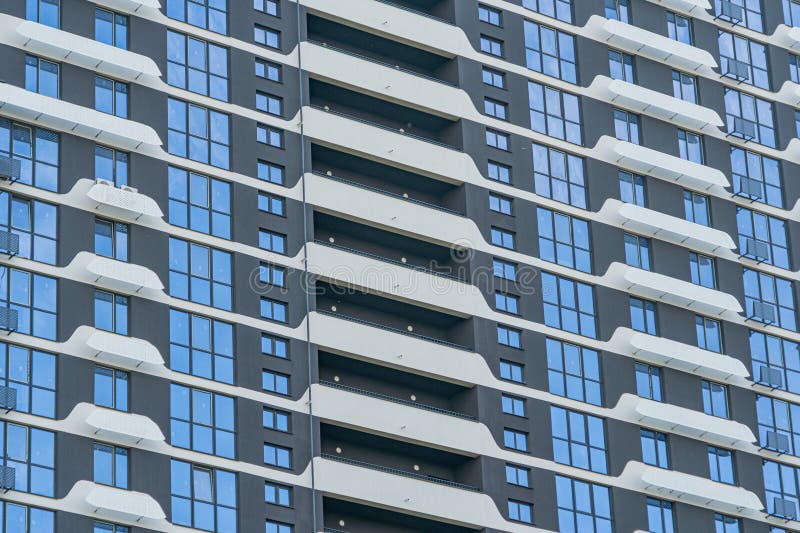 Modern High-rise Building with Dark and Light Horizontal Bands, Striped Pattern, Numerous ...