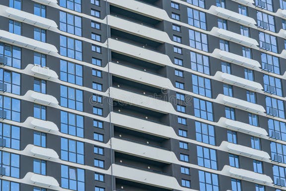 Modern High-rise Building with Dark and Light Horizontal Bands, Striped ...