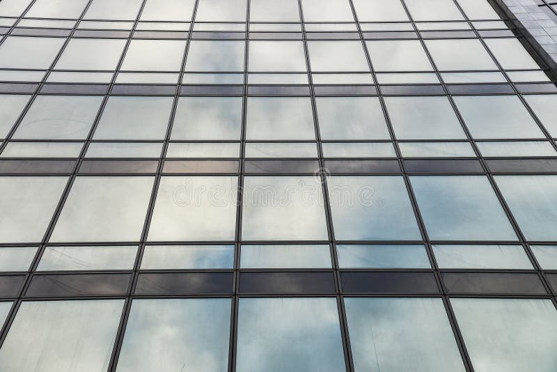 Modern High Rise Building Glass Wall with Blue Sky Reflection Stock ...