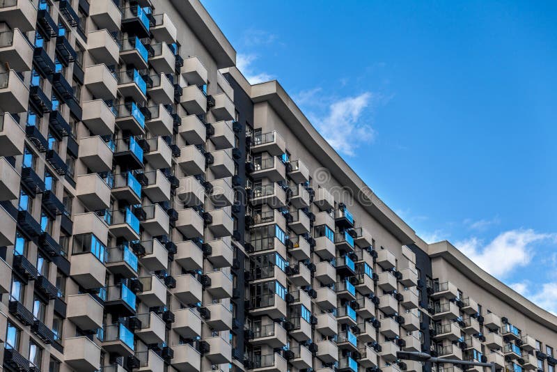 Modern High-rise Buildings Opposite a Clear Blue Sky in Perspective ... Modern High-rise Buildings Opposite a Clear Blue Sky in Perspective ...