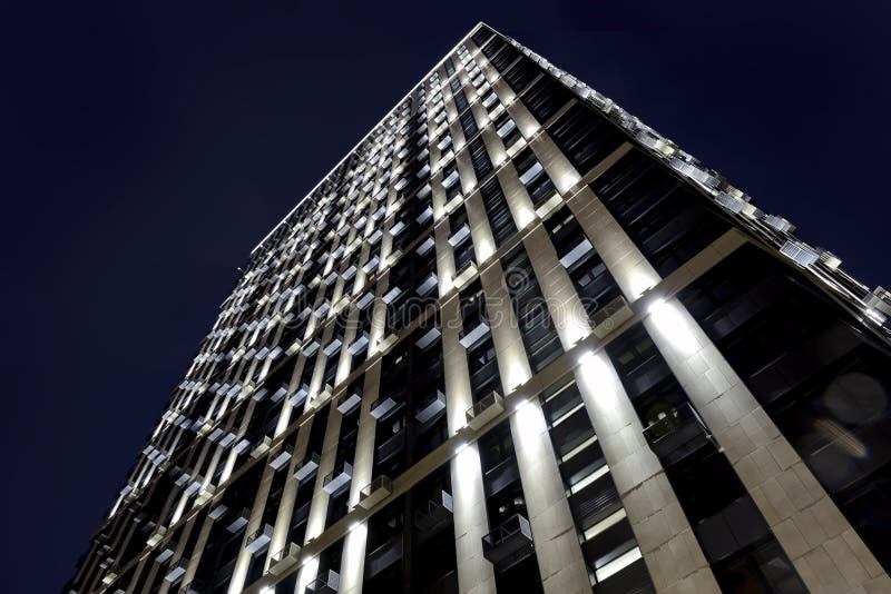 Modern High-rise Residential Building at Night. Bottom View Stock Image ...