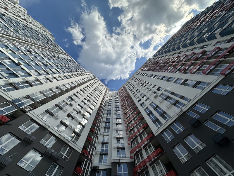 A Modern High Rise Residential Complex with Many Windows, a Skyscraper ...