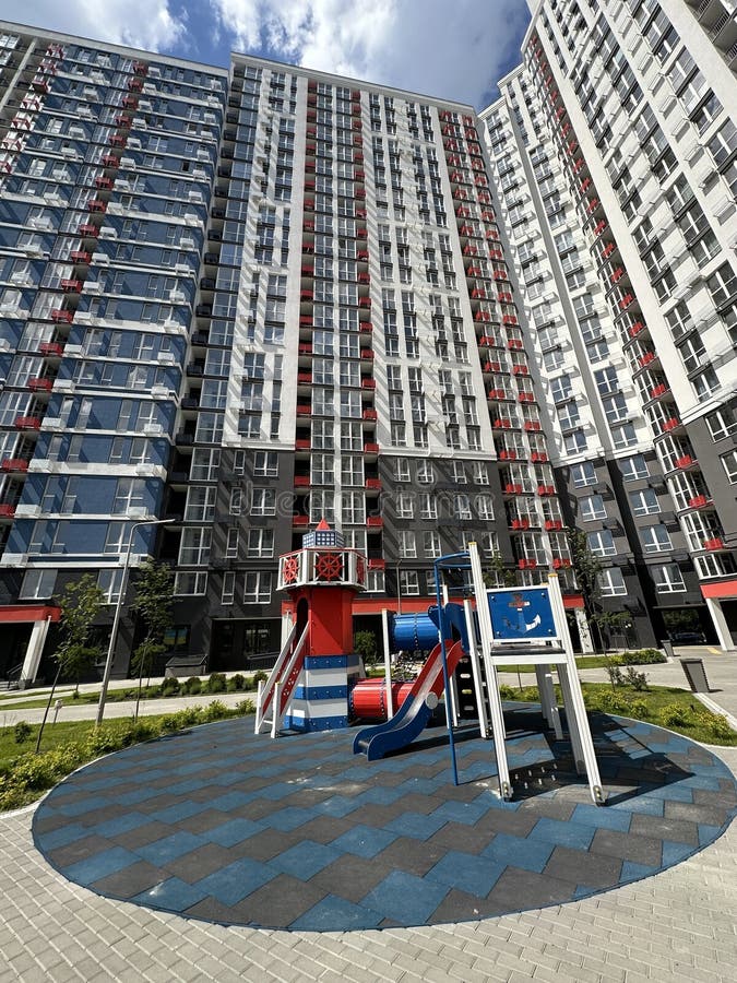 A Modern High Rise Residential Complex with Many Windows, a Skyscraper ...