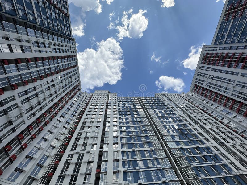 A Modern High Rise Residential Complex with Many Windows, a Skyscraper ...