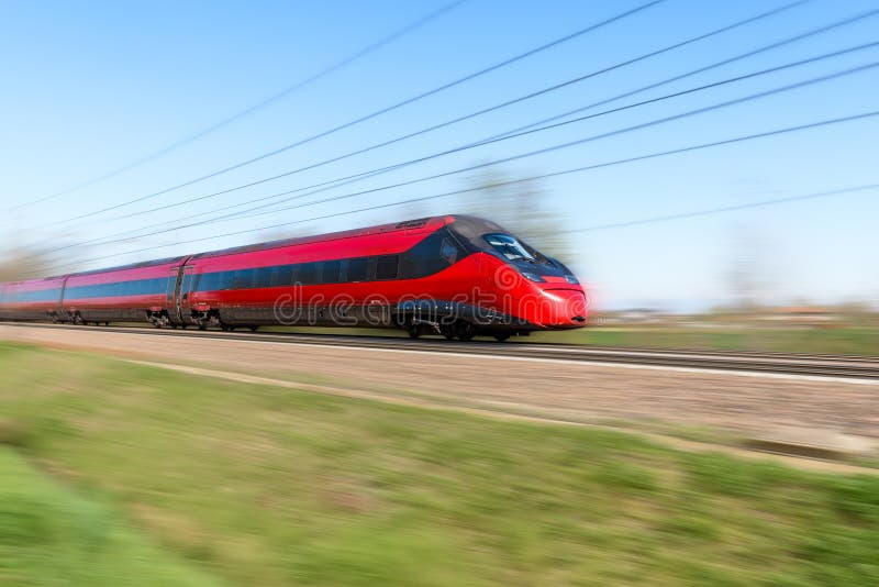 Modern High Speed Train in Motion on a Sunny Spring Day Stock Image ...