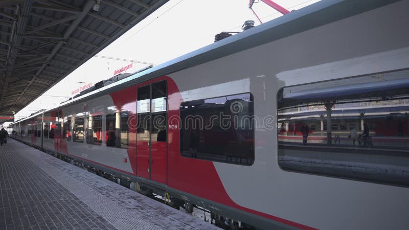 A Modern High-speed Train on the Platform in Winter. Railway Platform ...