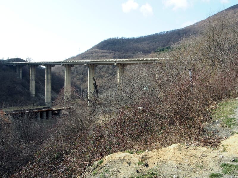 High Stone Bridge Over a Mountain River in Georgia Stock Image - Image ...