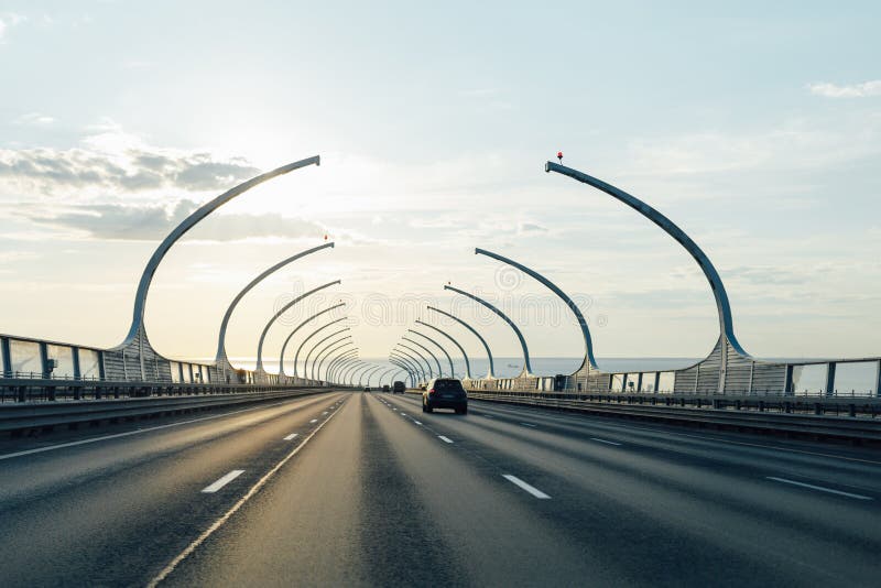 Modern highway at sunset stock image. Image of sunny - 123735633