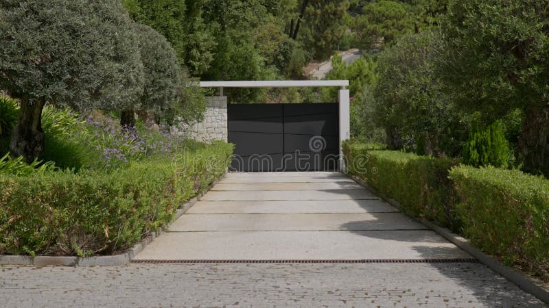 Modern Home Entrance with Automatic Gate in Suburbia, Daytime Stock ...