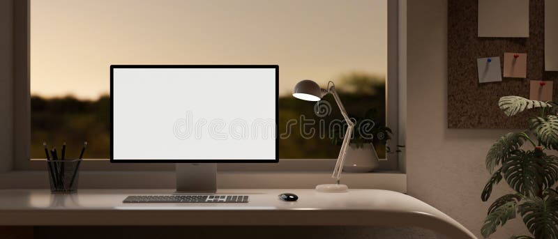 Modern Home Office in the Evening with a White-screen Computer on a ...