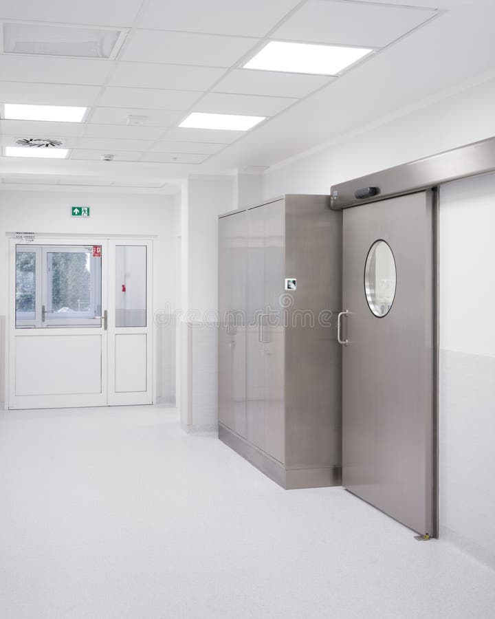 Modern Hospital Hallway with Stainless Steel Door and Exit Sign Stock ...
