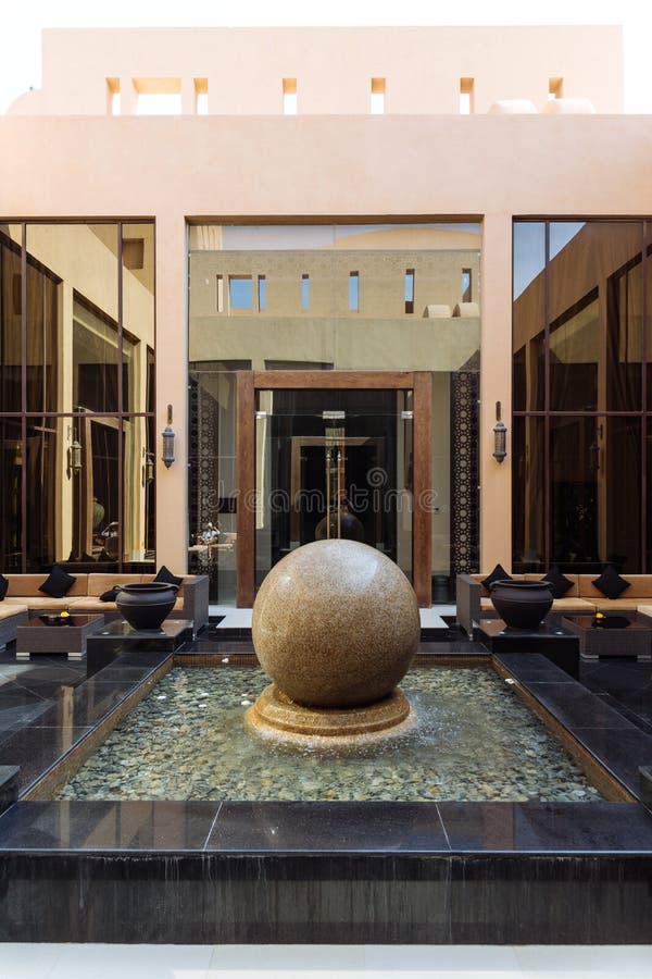 Modern Hotel Outdoor Reception Area with Marble Sphere on the Pool at ...