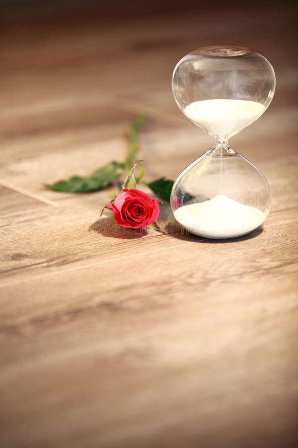 Modern Hourglass and Red Rose with Copy Space. Stock Photo - Image of ...
