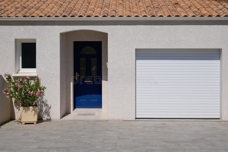 Modern House Facade with Contemporary White Garage Roll Gate Door Stock ...
