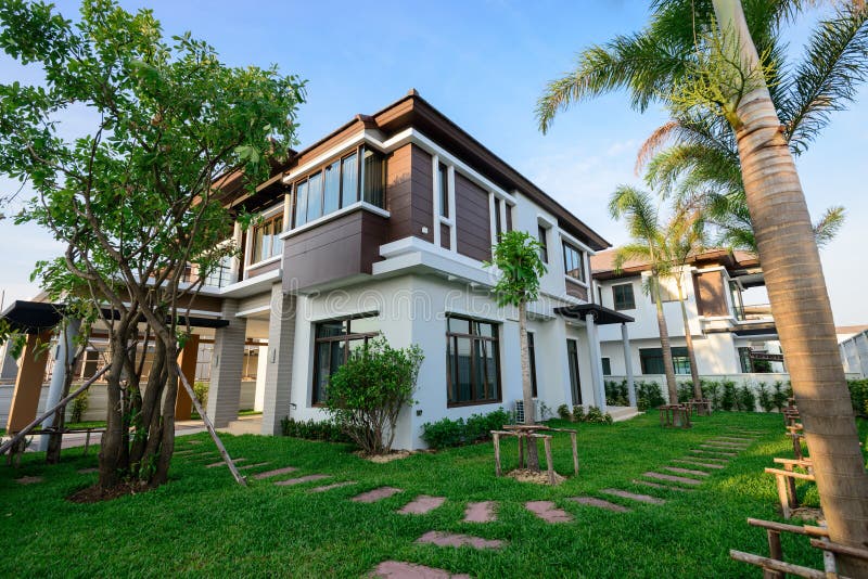 Modern house and garden stock photo. Image of accommodations - 39647186