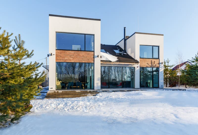 A Modern House with Large Panoramic Windows in the Background of Stock ...