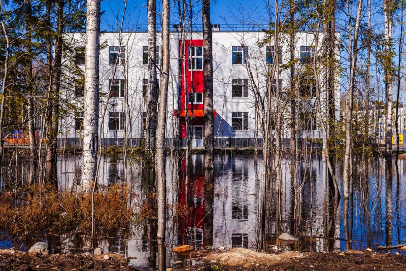 Modern House and a Large Puddle Near it, Flooded Area Stock Photo ...