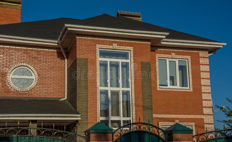 Modern House with Large Rectangular and Round Windows Stock Photo ...
