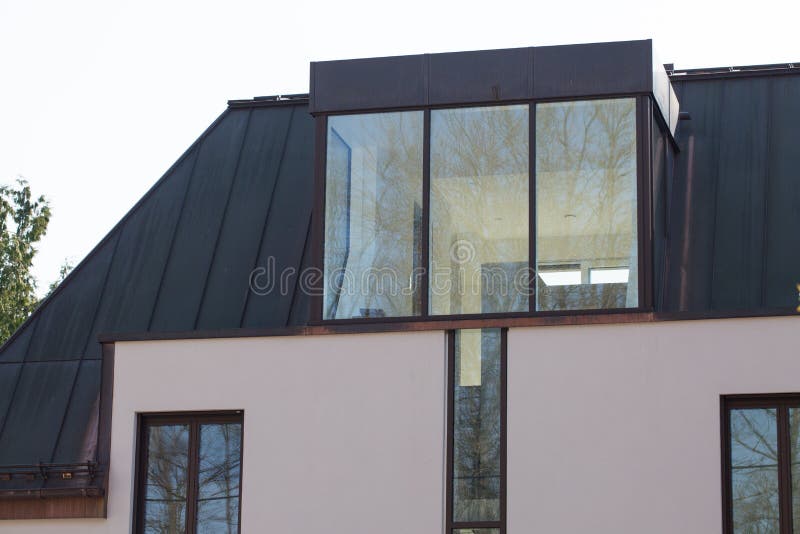 Modern House with Large Roof Windows Stock Photo - Image of saddle ...