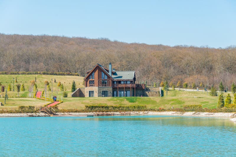 Modern House Near Water on Bright Day Stock Photo - Image of exterior ...