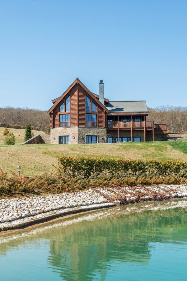 Modern House Near Water on Bright Day Stock Photo - Image of dwelling ...