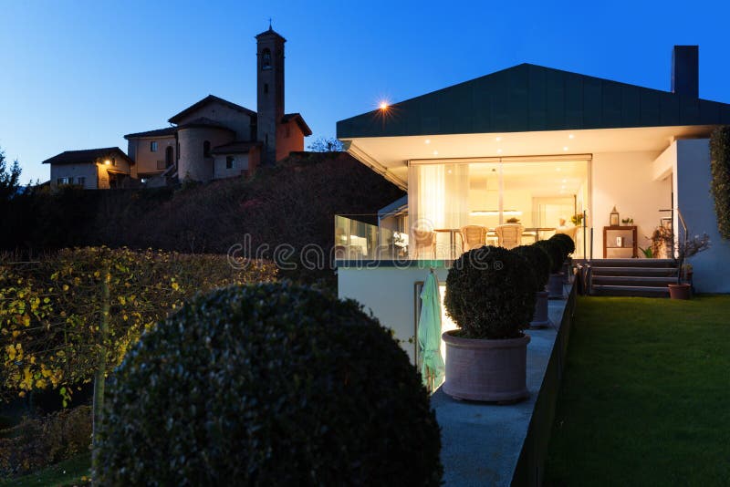 Modern house by night stock image. Image of residential - 63457181