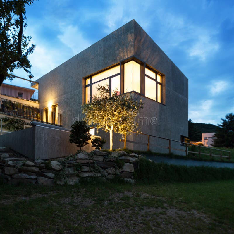 Modern house by night stock image. Image of concrete - 57694441