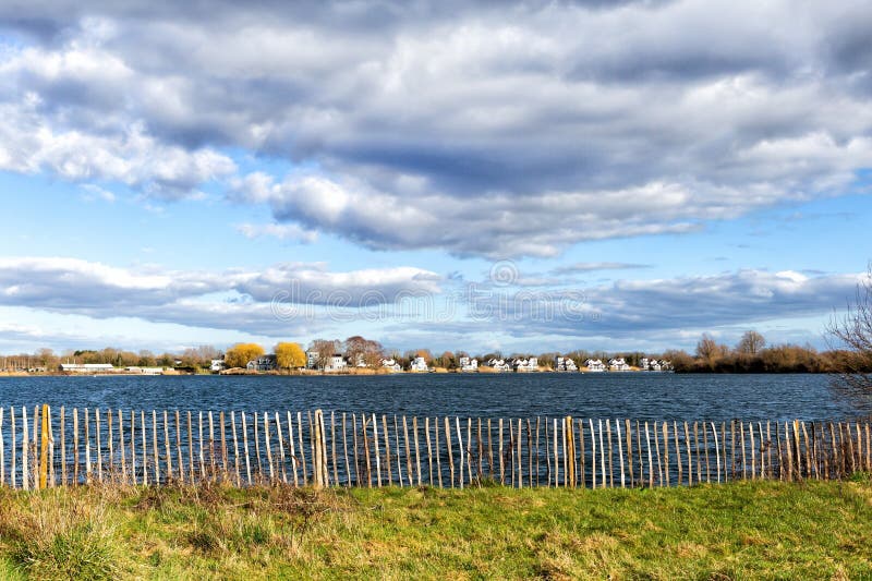 Modern Houses and a Park Around a Lake Stock Photo - Image of park ...