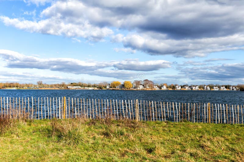 Modern Houses and a Park Around a Lake Stock Image - Image of clouds ...