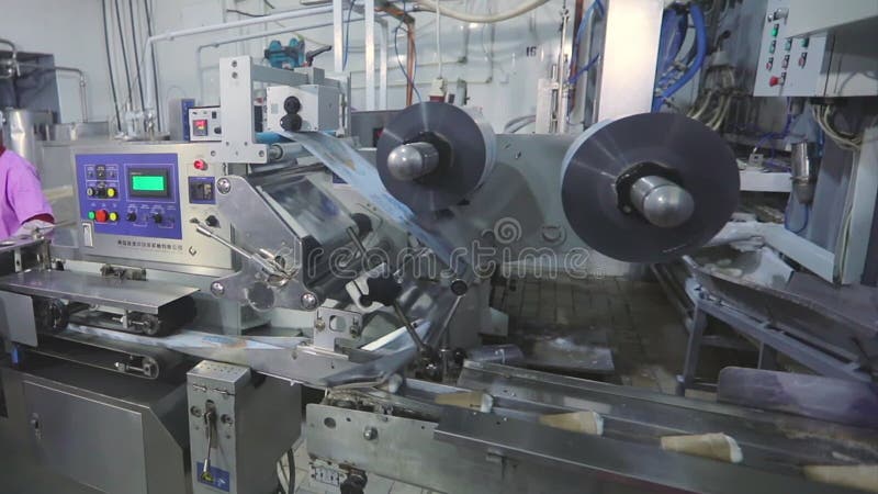 Modern Ice Cream Factory. Automatic Packaging Line in an Ice Cream ...