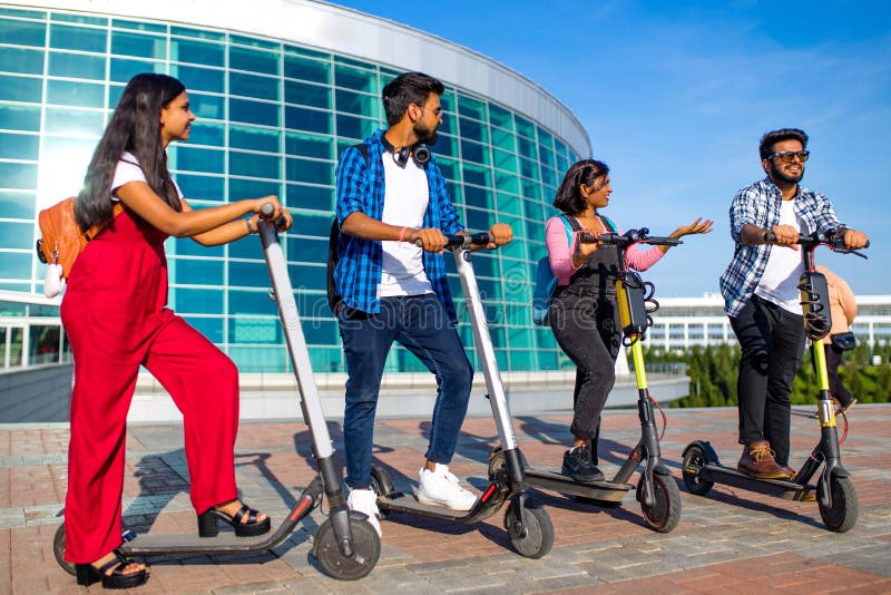 Modern Indian Friends Ride on Segway in Park in India Stock Photo ...